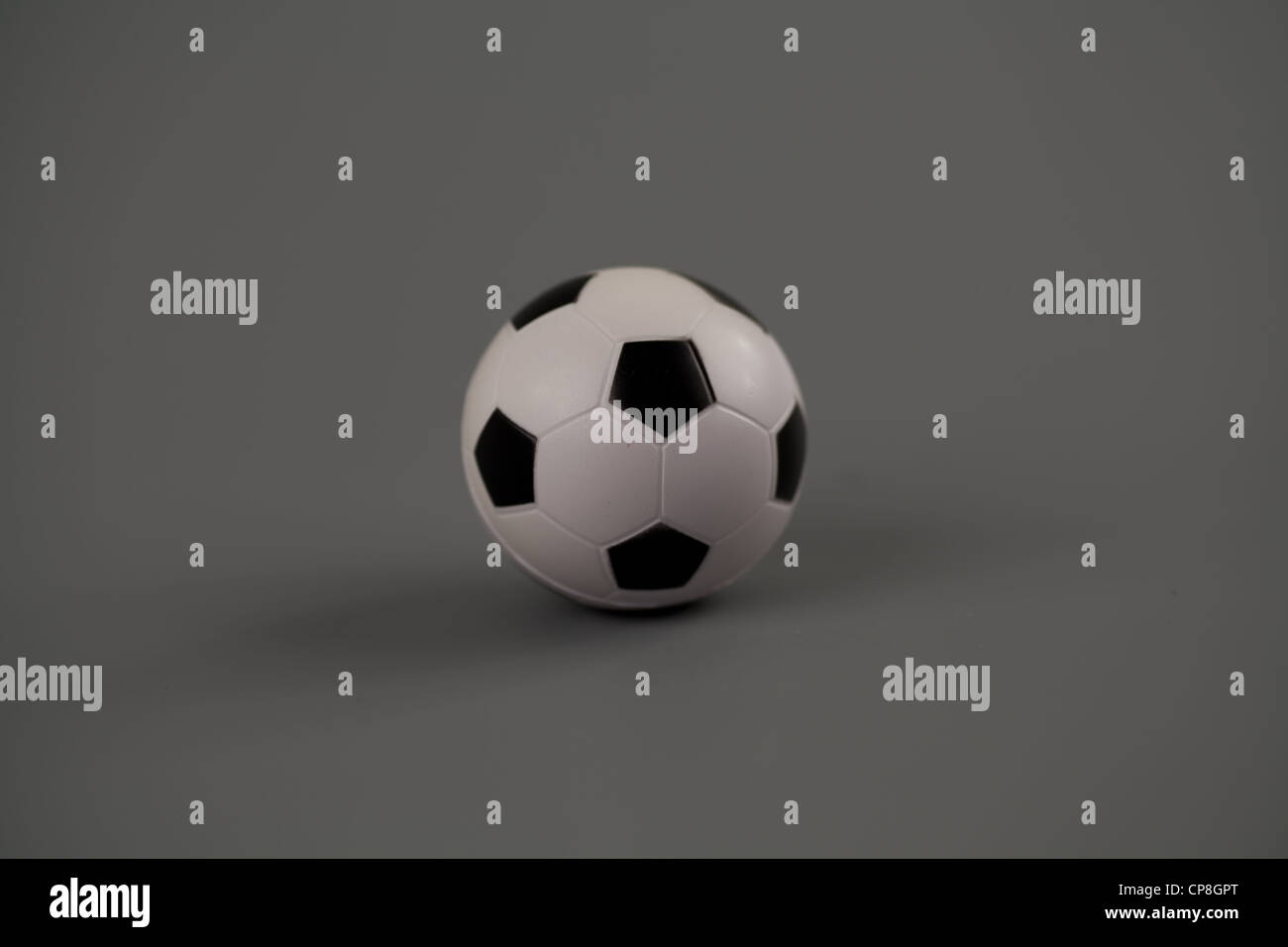 Football isolated on gray Stock Photo - Alamy