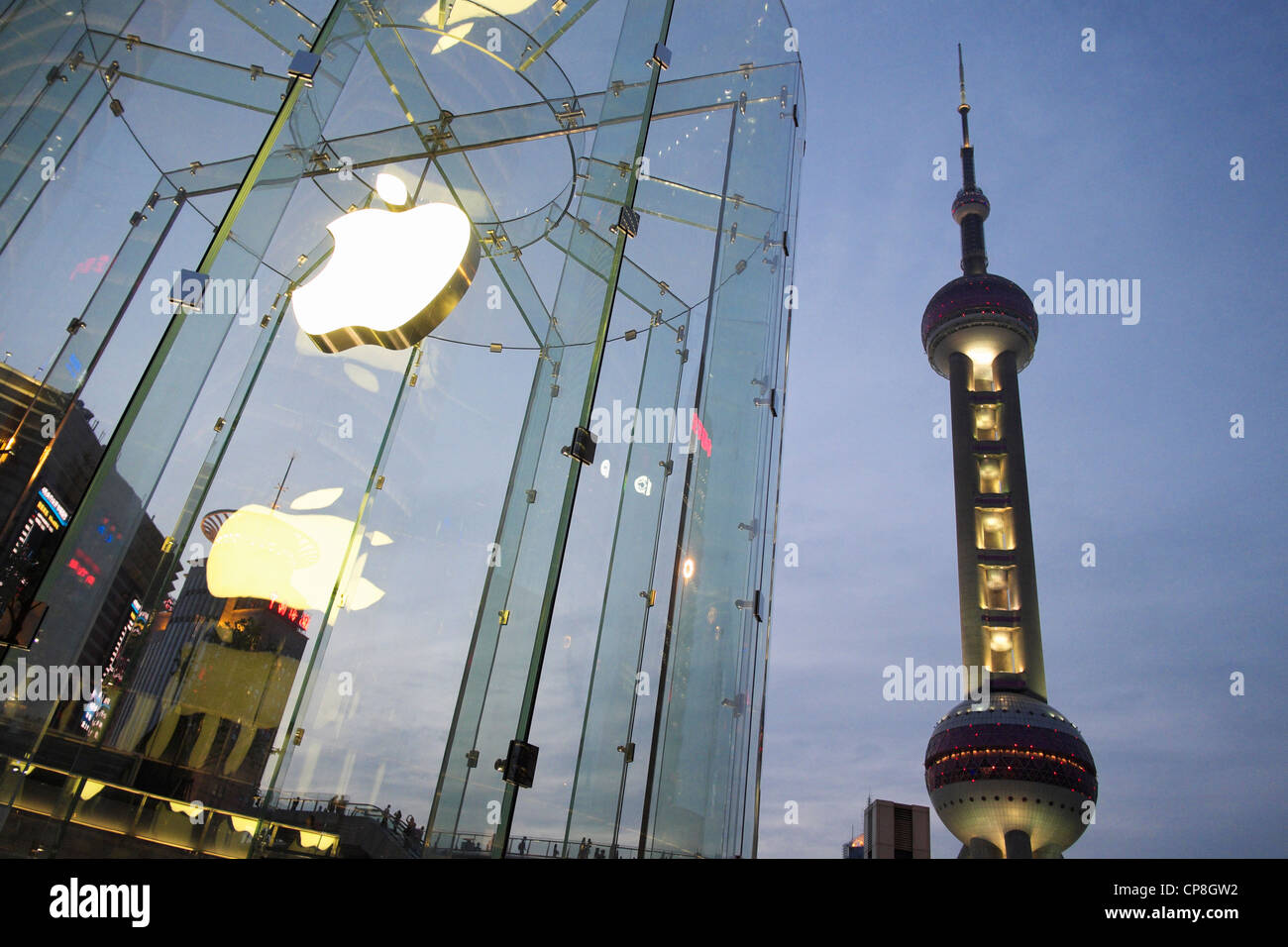 View of large modern Apple store and Pearl Oriental Tower in Pudong in ...