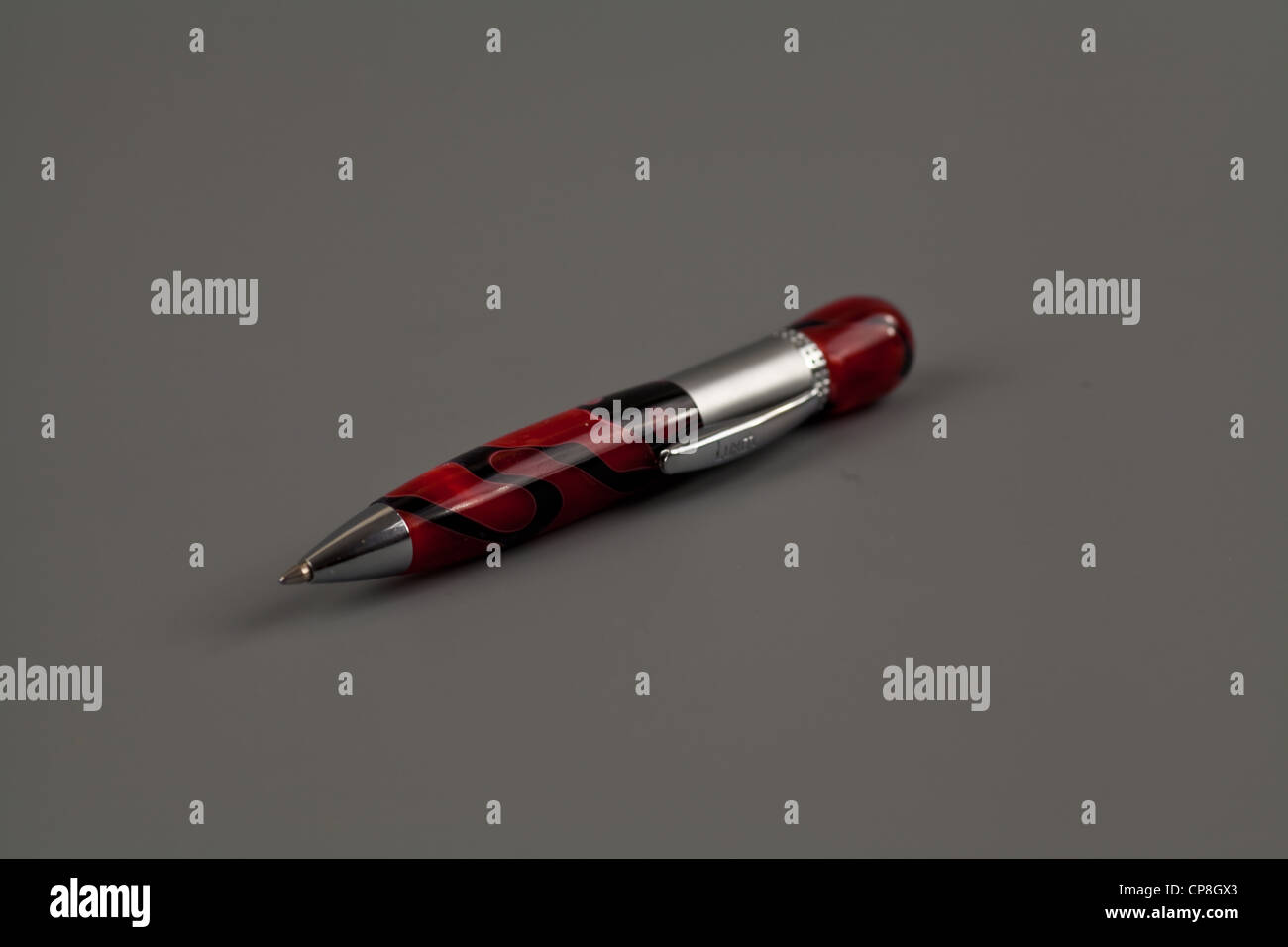 Ball pen on gray background Stock Photo - Alamy