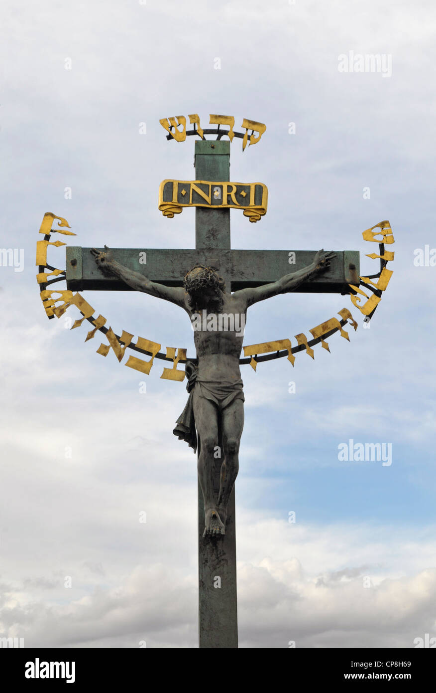 Gilded Crucifix statue on the Charles Bridge Prague Czech Repiblic ...