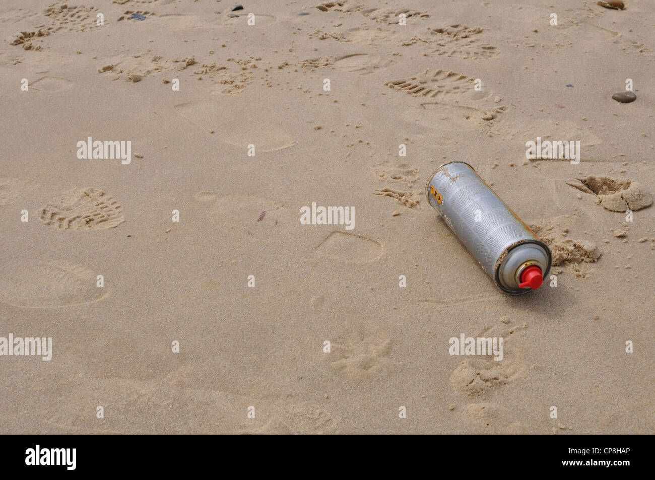 Can on sand Stock Photo - Alamy