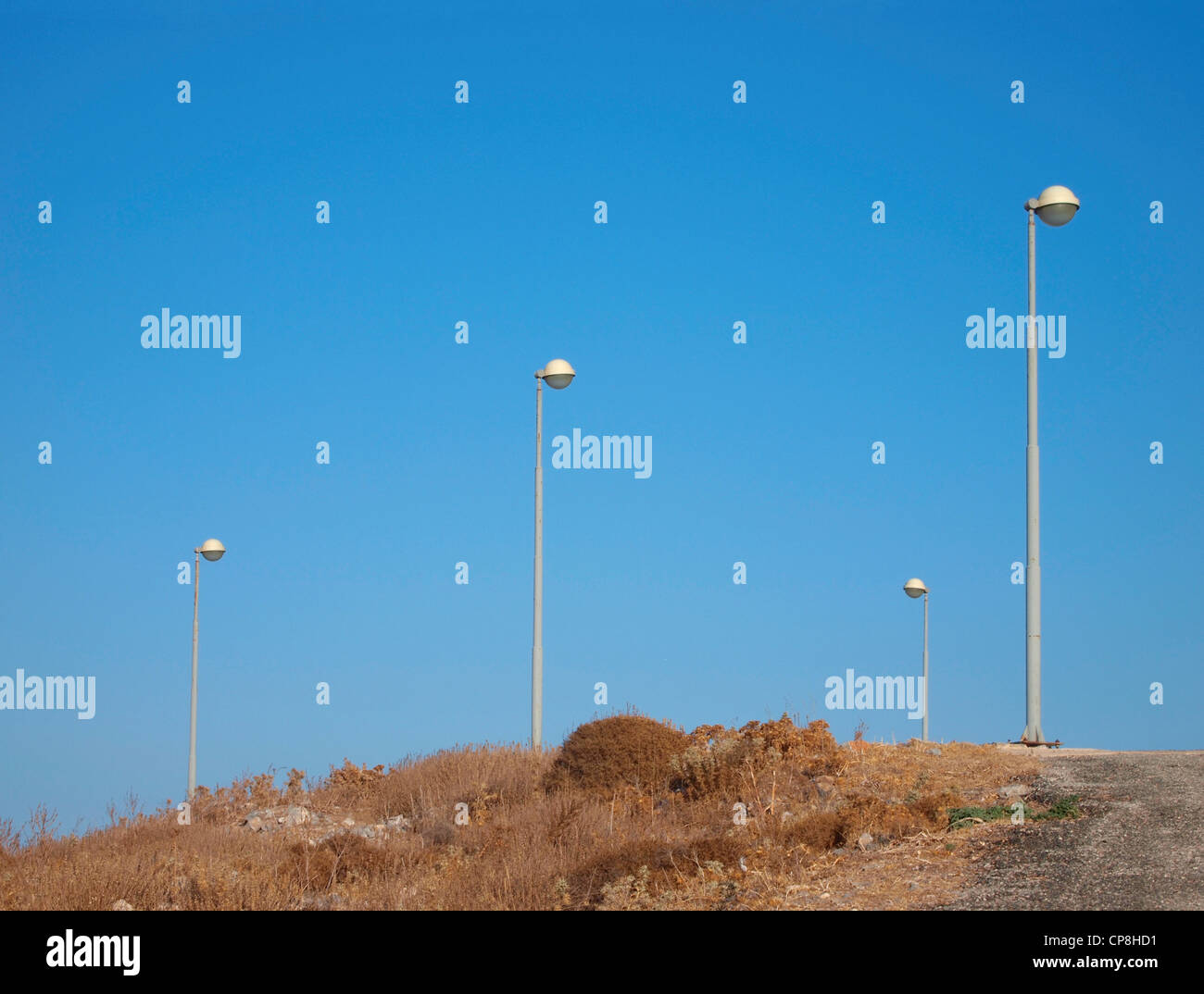 Row of lamp poles hi-res stock photography and images - Alamy