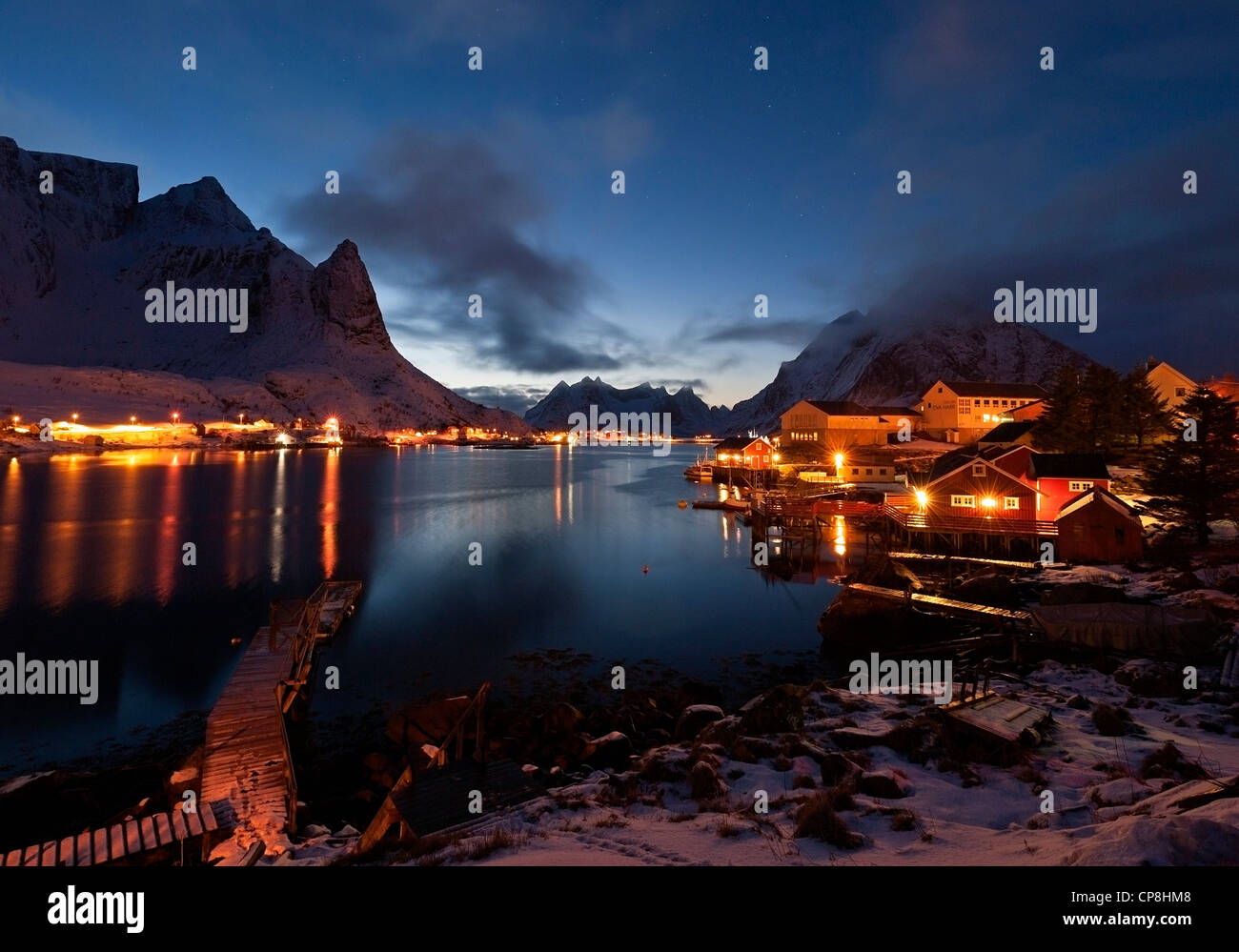 A night view of Reine village and Reinefjord, with the mountains of ...