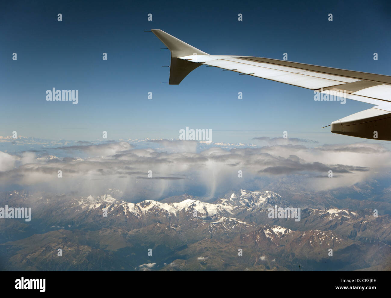 The view from the airplane window. Alps Stock Photo - Alamy