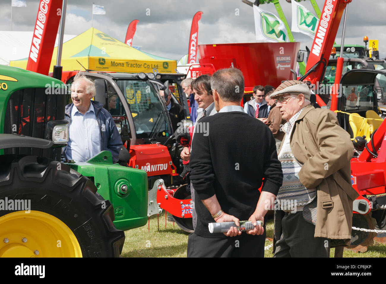 Men looking at the display of agricultural equipment at the Anglesey ...