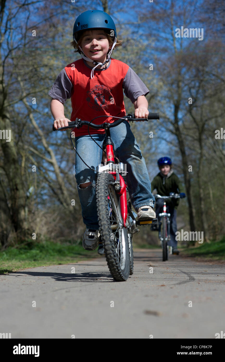 Children cycling on bike trails Stock Photo - Alamy