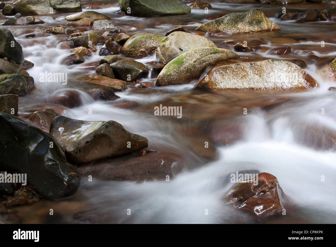 Fast moving water over rocks hi-res stock photography and images - Alamy