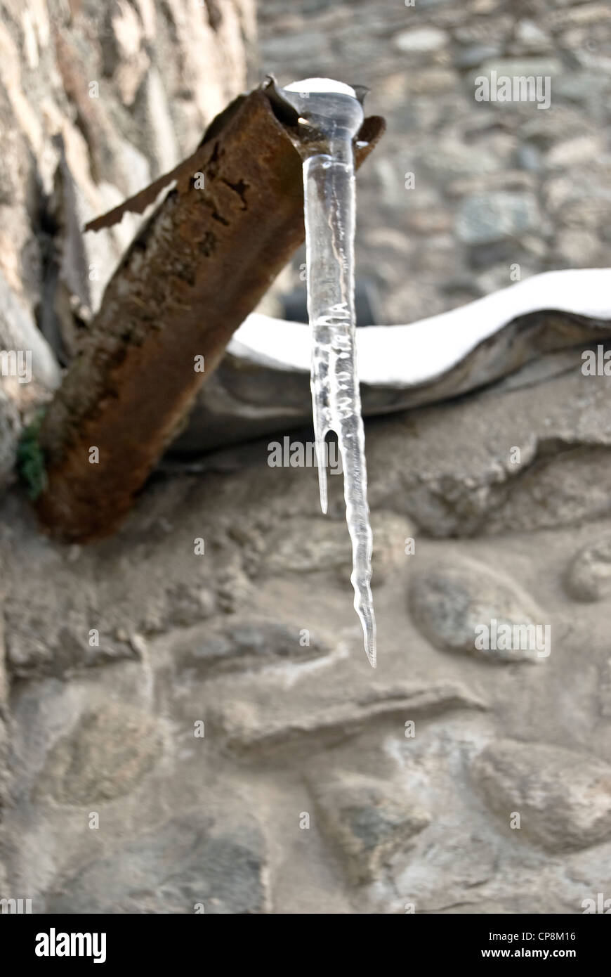 Gutter with ice Stock Photo - Alamy