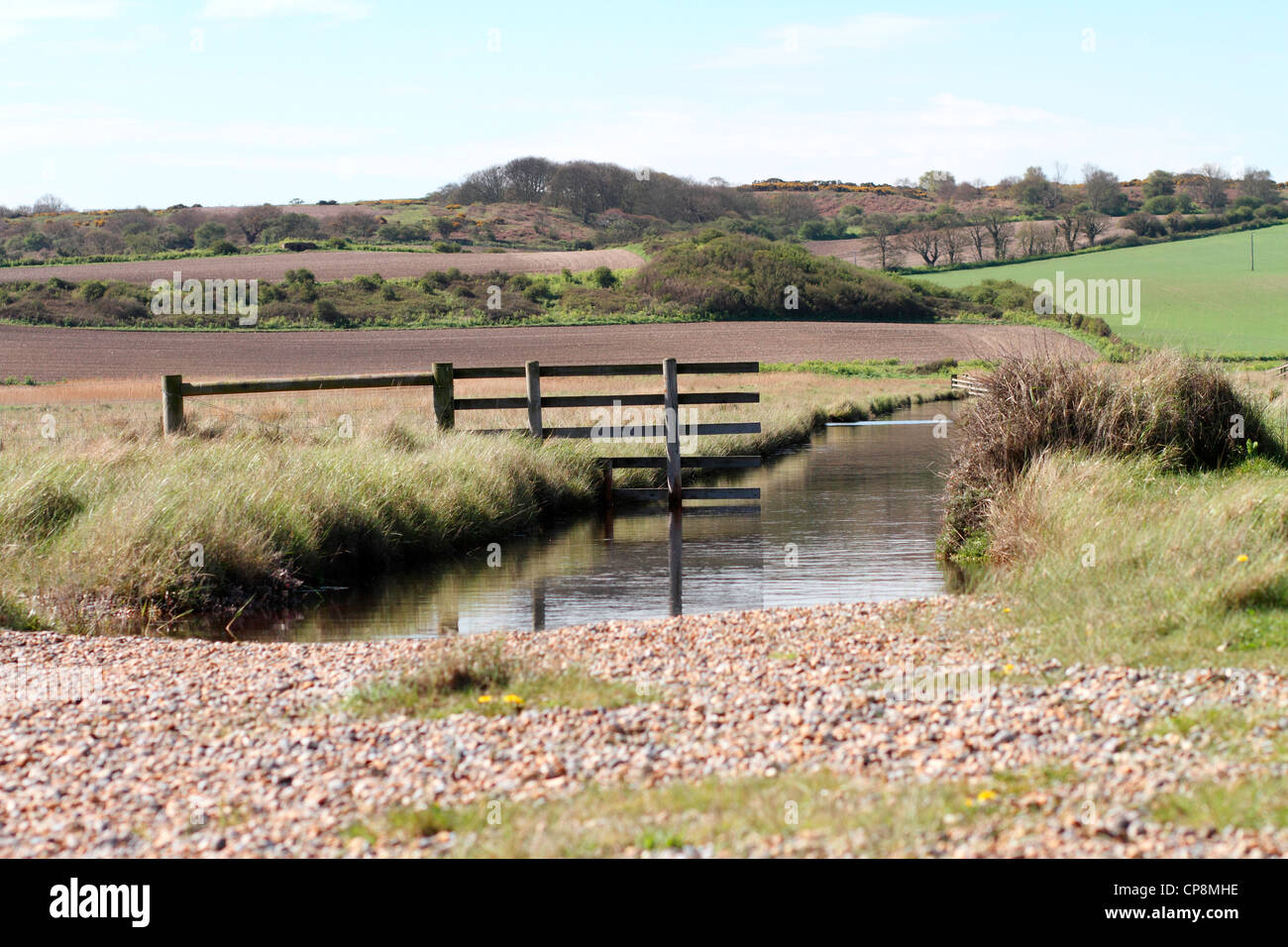 Walkers enjoying a stroll along the "North Norfolk" "Coastal Path" East ...