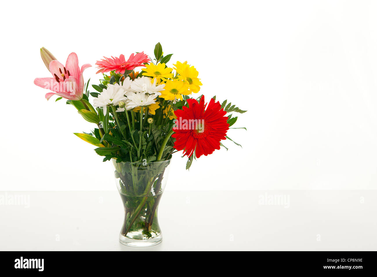 glass vase of isolated flowers Stock Photo - Alamy