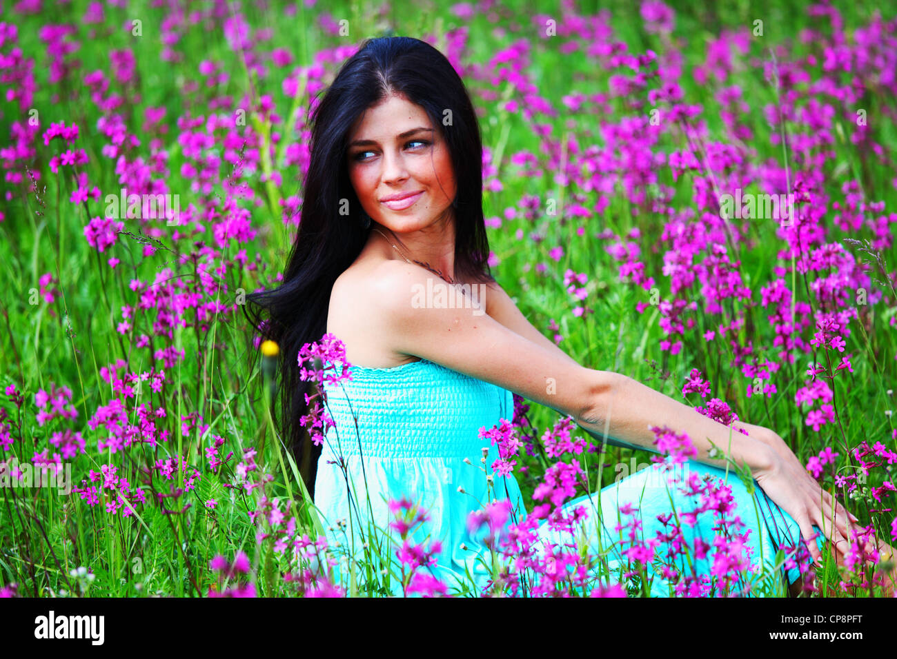 woman on summer flower field Stock Photo - Alamy