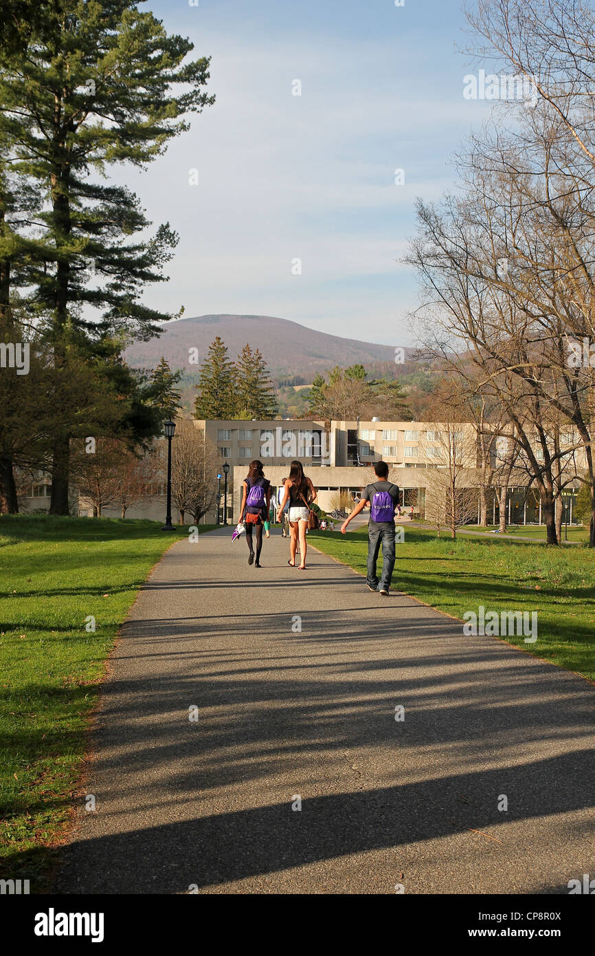 Students walk down a tree-lined path towards a building on the Williams ...