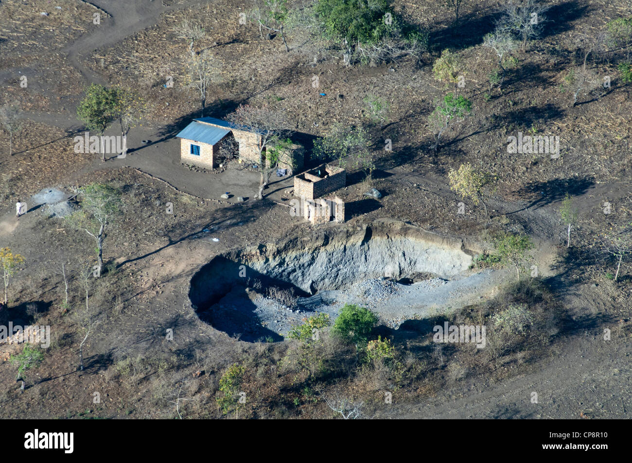 House and a small quarry for building materials, aerial view, Arusha ...