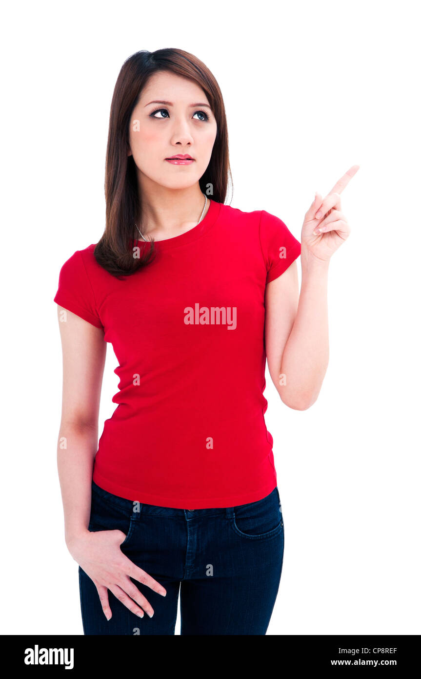 Attractive young woman pointing Stock Photo - Alamy