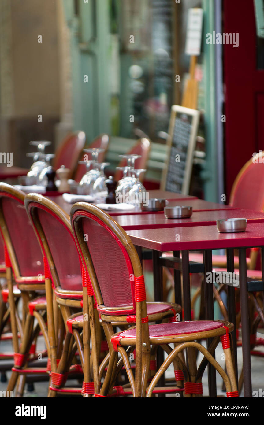 Empty tables and chairs at Cafe de la Butte in the the Montmartre ...