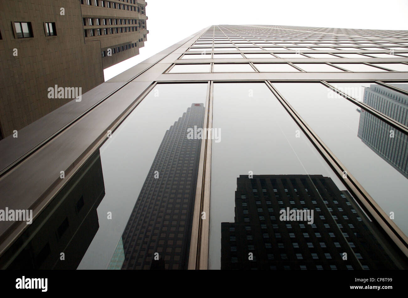 Reflections of several office towers in the windows of the CIBC ...