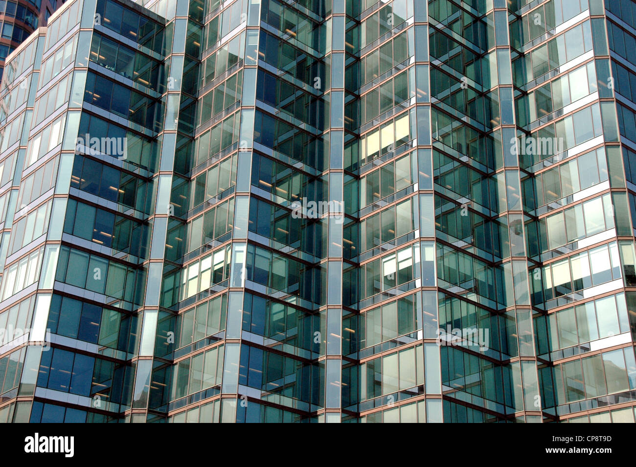 The exterior facade and glass windows of an office tower in the ...