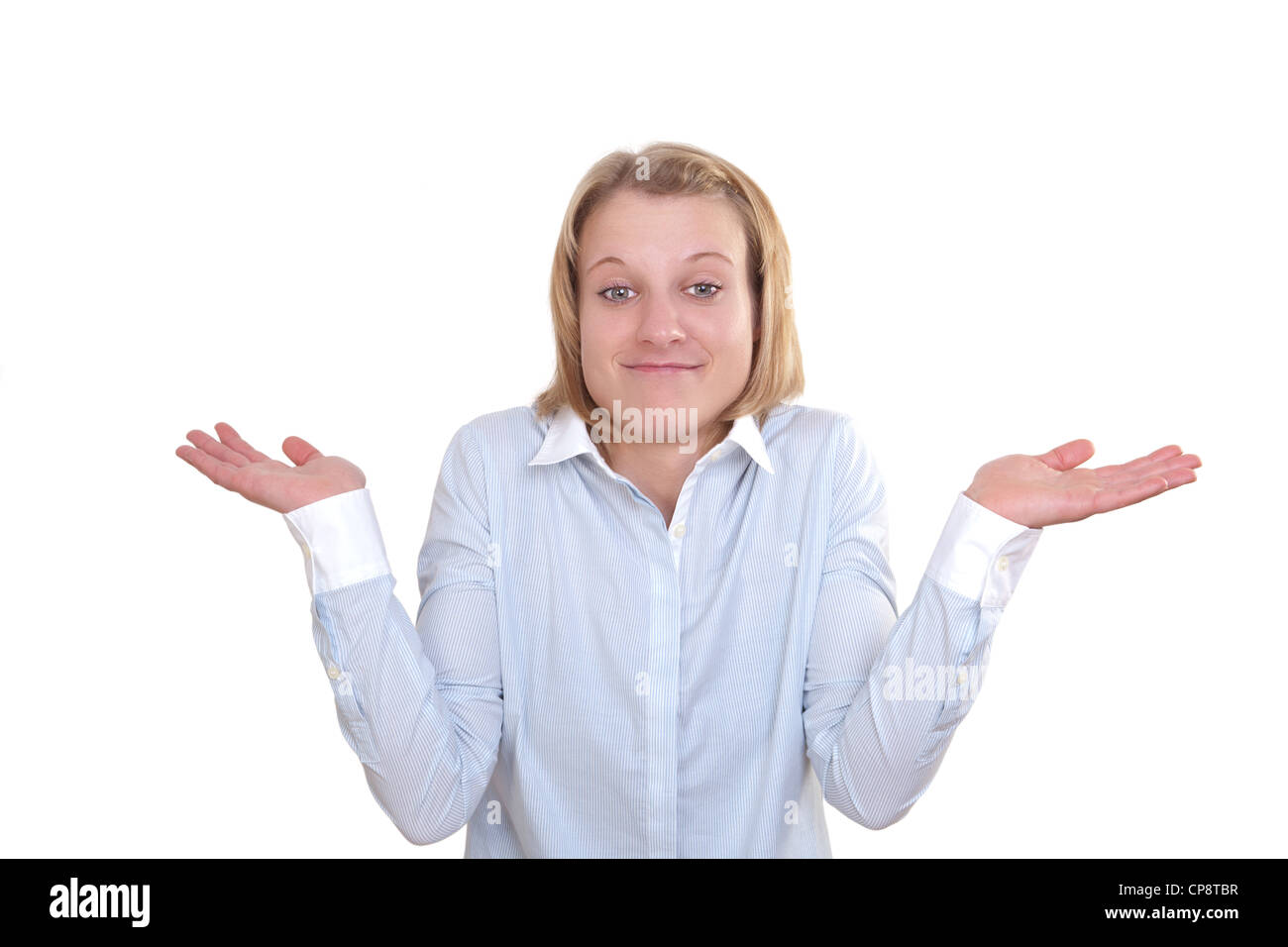 Young woman shrugs her shoulders in a clueless gesture Stock Photo - Alamy
