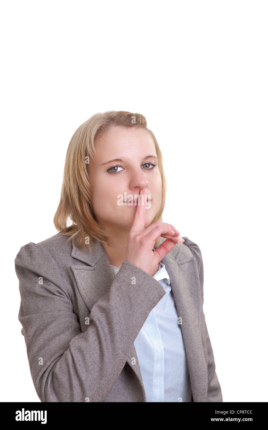 Young girl hold index finger on her lips Stock Photo - Alamy