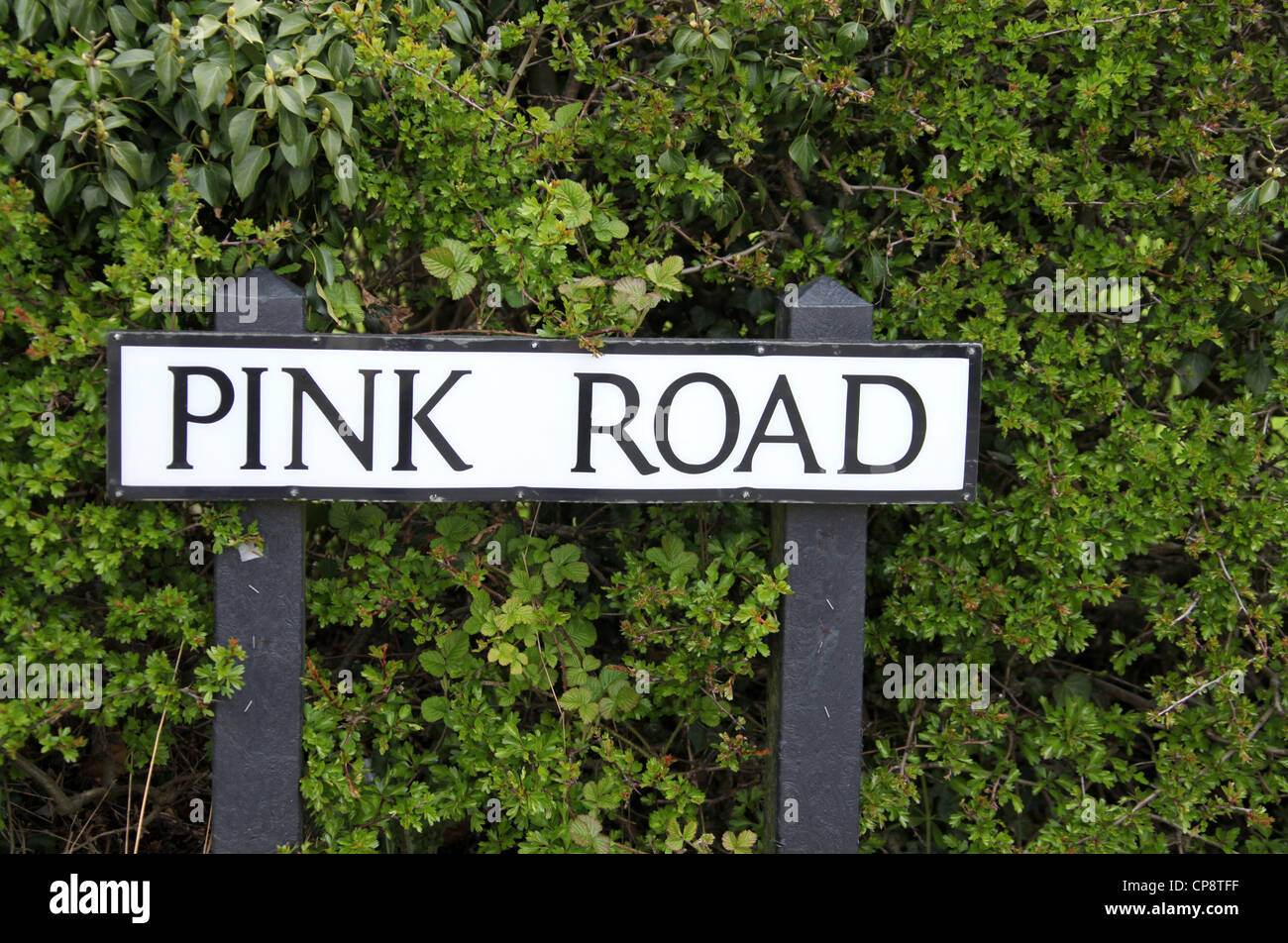 Pink road sign hi-res stock photography and images - Alamy