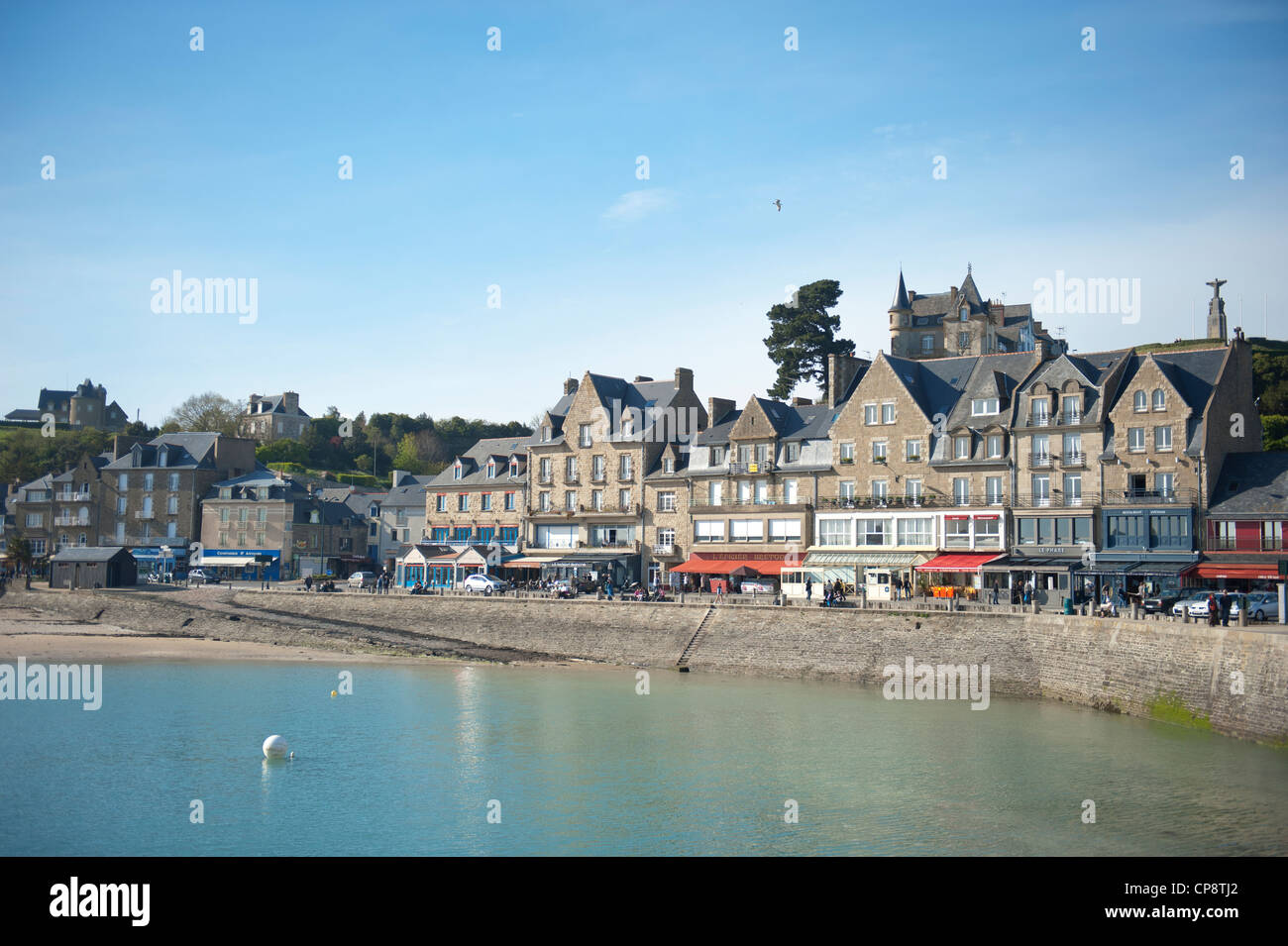 Waterfront with traditional granite houses and restaurants at Cancale ...