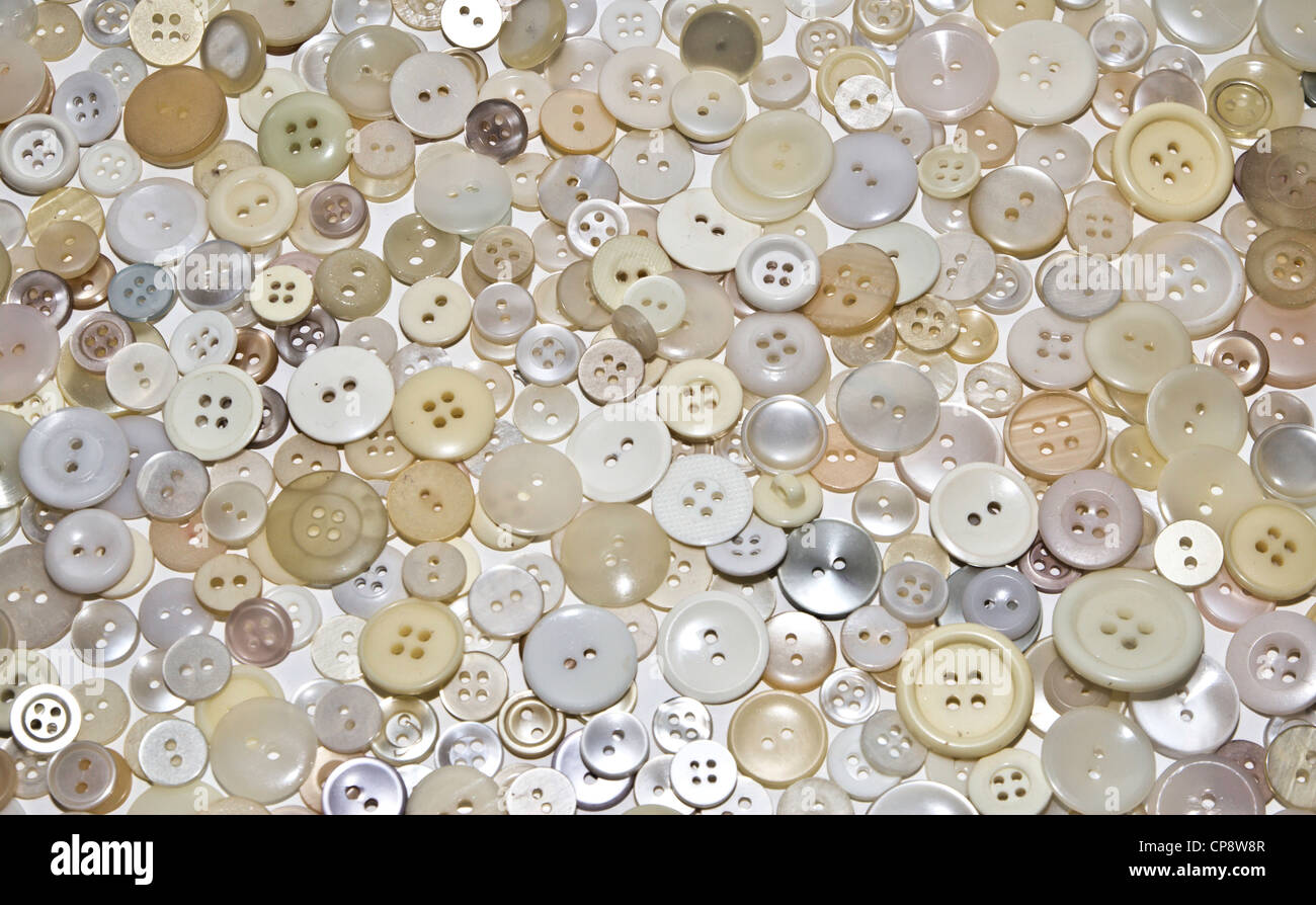 light color sewing buttons Stock Photo - Alamy
