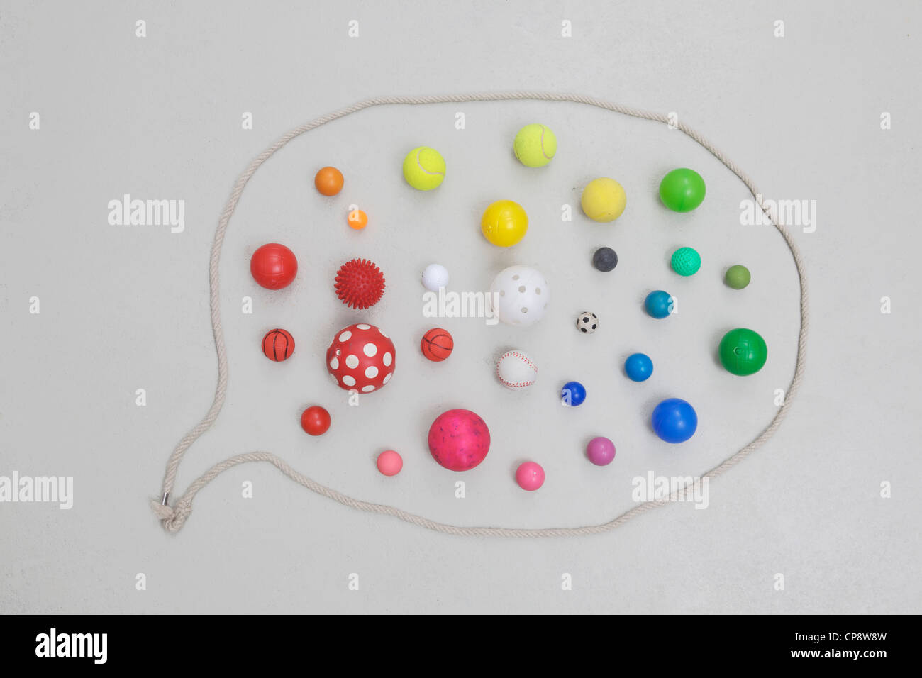 Variety of balls in speech bubble Stock Photo - Alamy