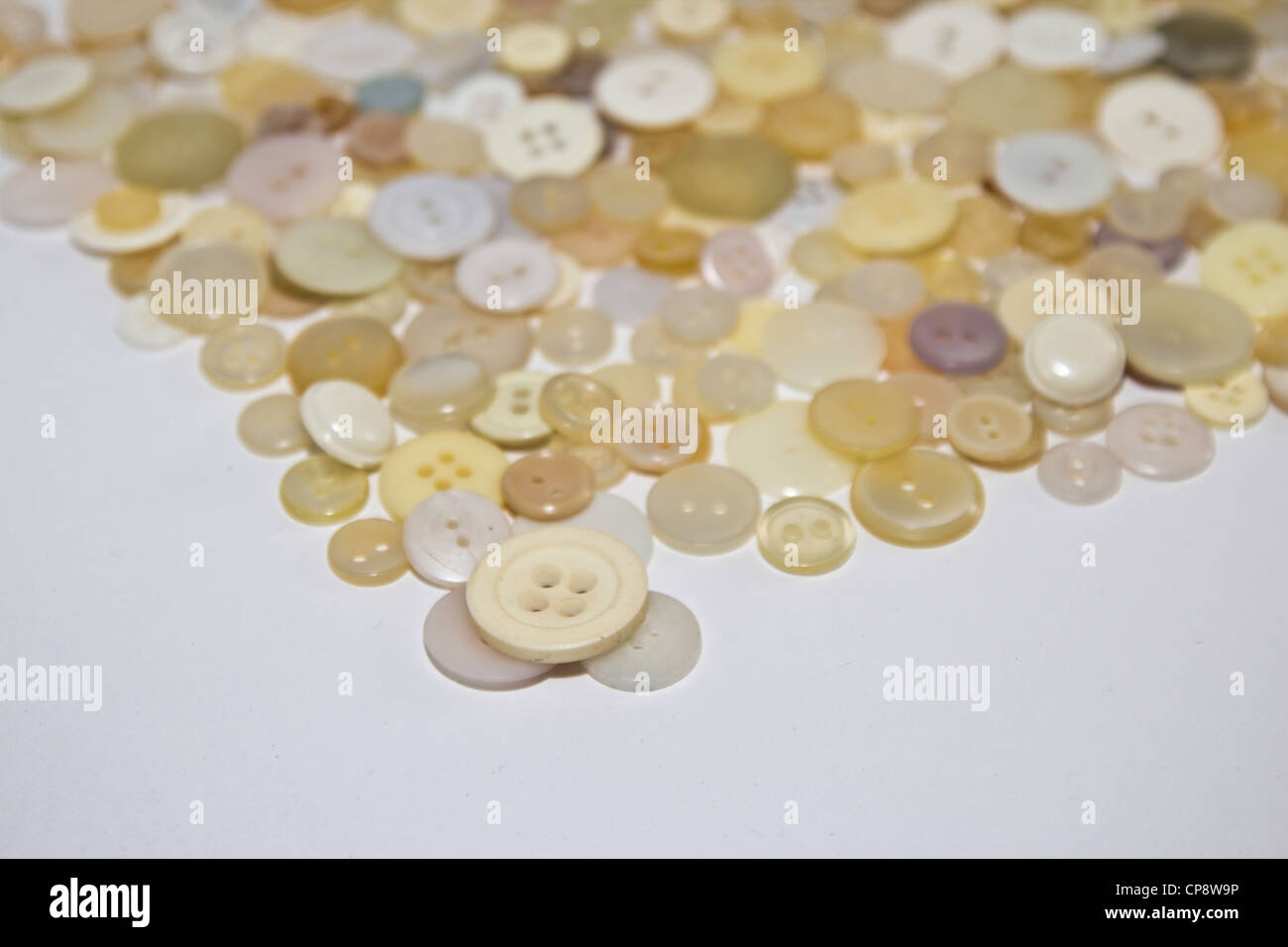 light color sewing buttons Stock Photo - Alamy