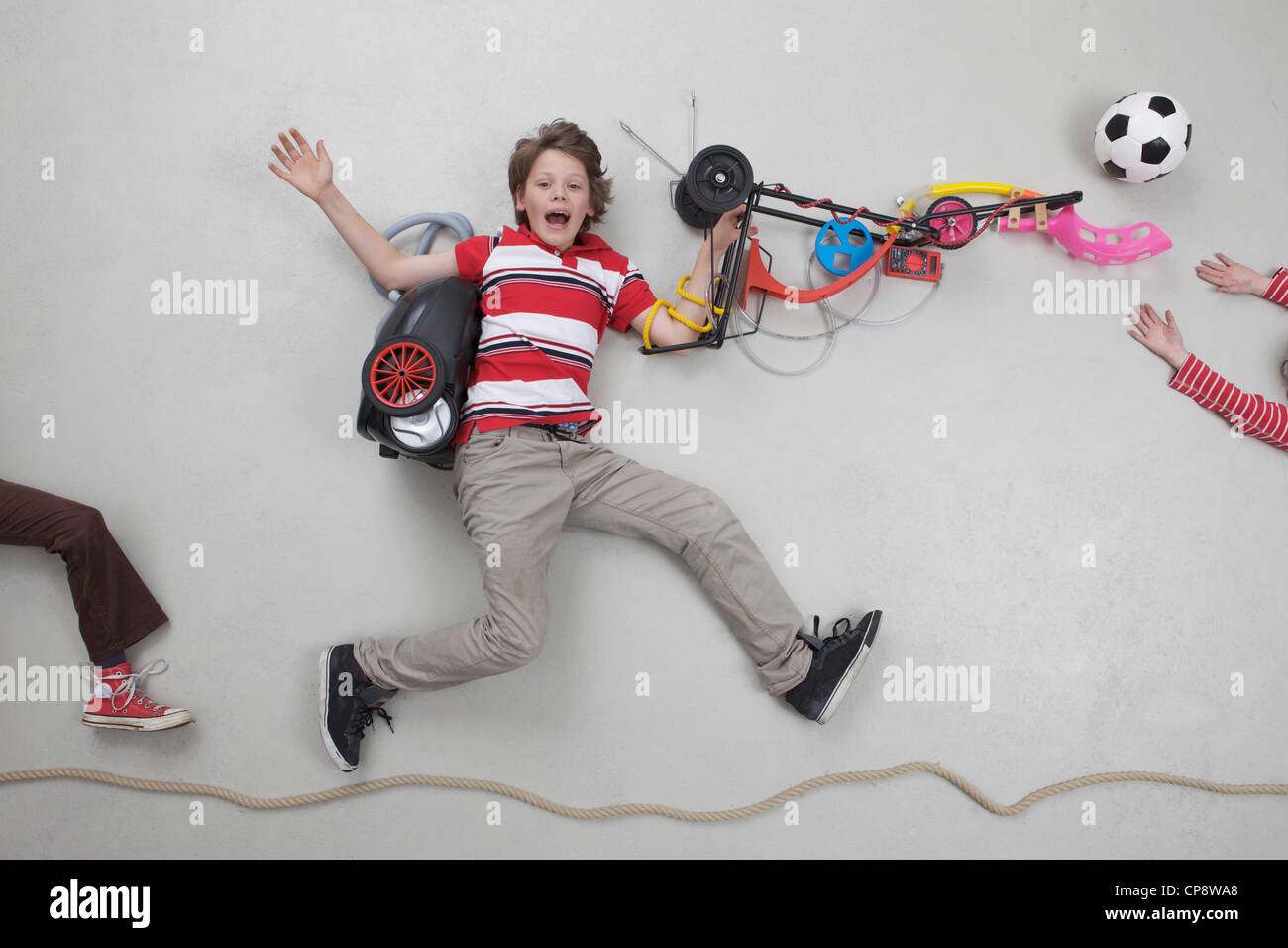 Boy with gadgets, portrait Stock Photo - Alamy