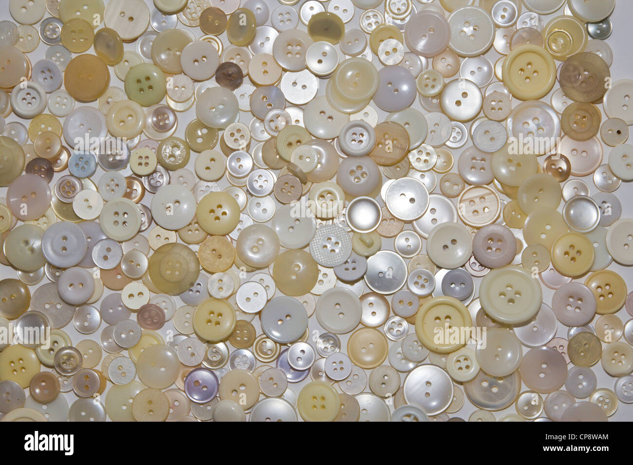 light color sewing buttons Stock Photo - Alamy