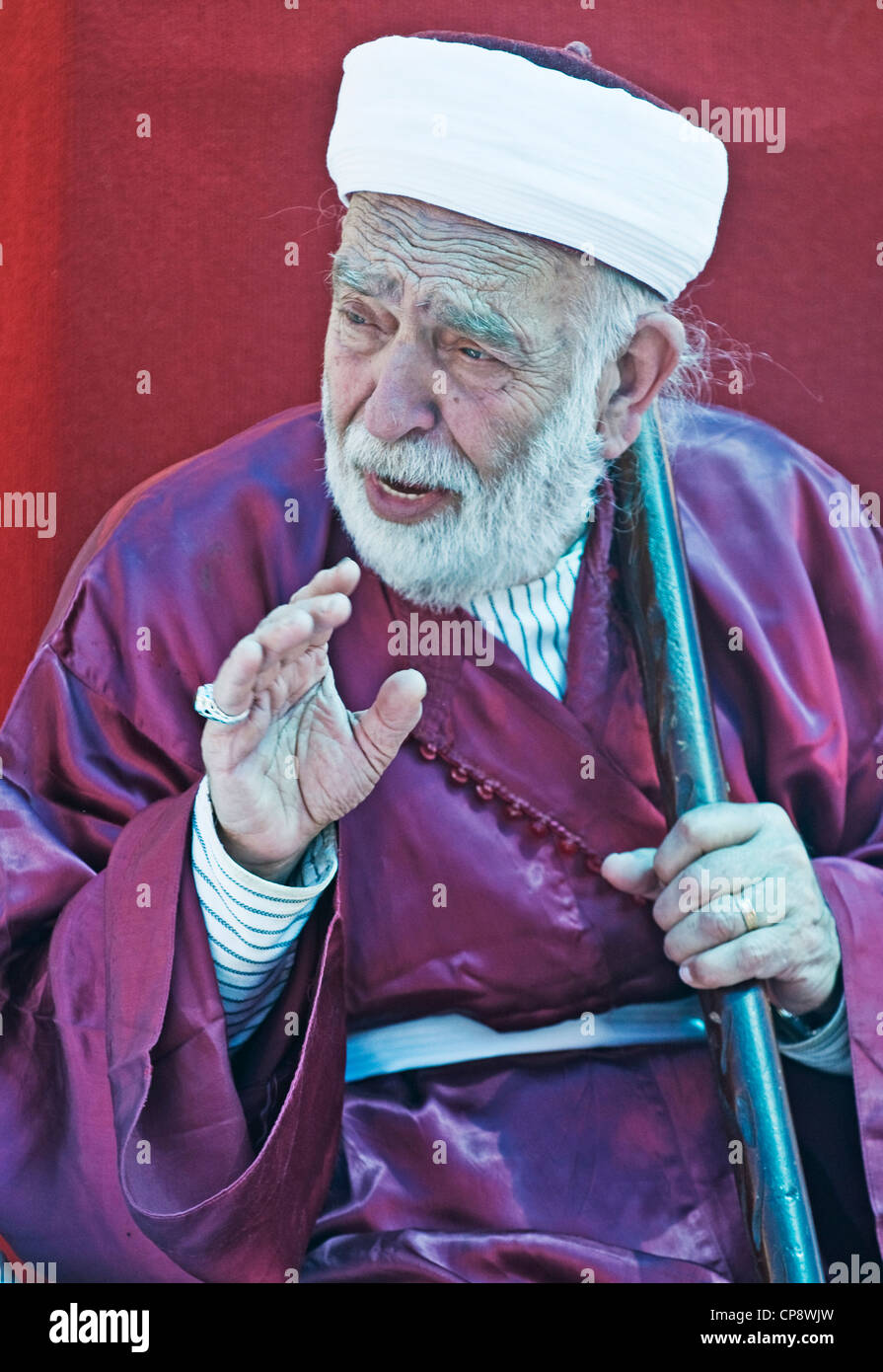 Old member of the ancient Samaritan community during the traditional ...