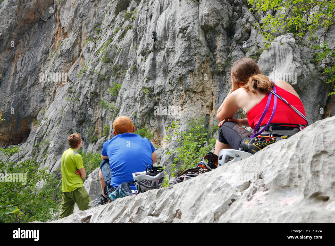 Climbers watching climbers on cliff in National park Paklenica Stock ...