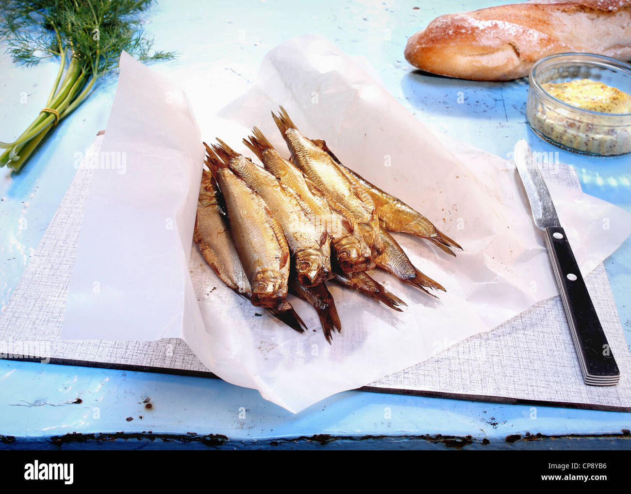 Fish with baguette and mayonnaise in paper hi-res stock photography and ...