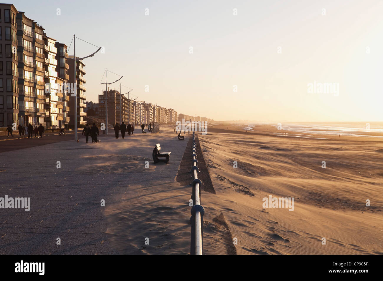 Belgium, Flanders, People walking along beach Stock Photo - Alamy