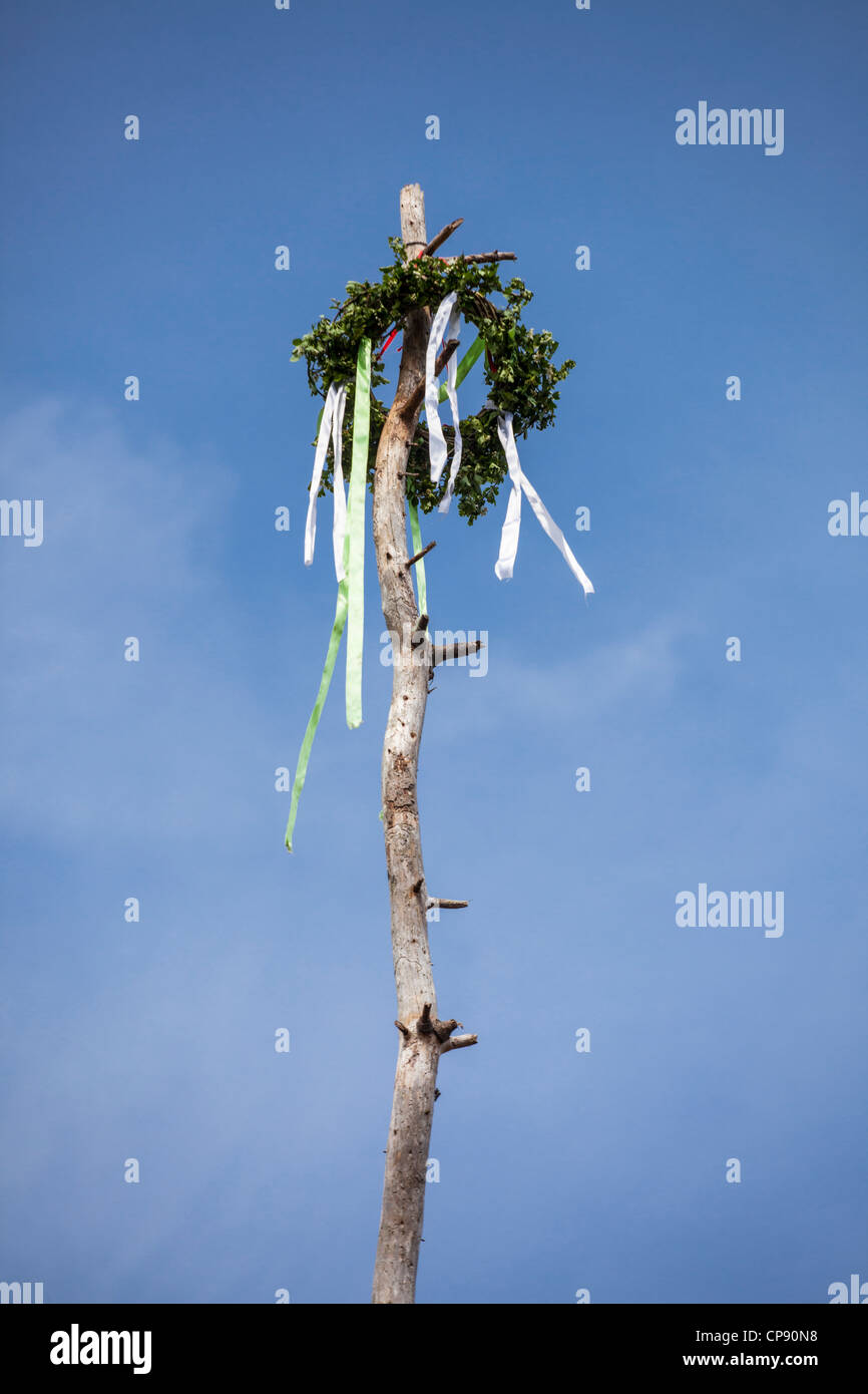 A traditional Maypole dressed for the May Day festivities Stock Photo ...