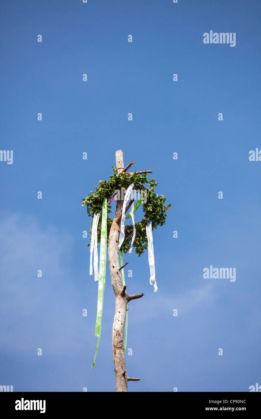A traditional Maypole dressed for the May Day festivities Stock Photo ...