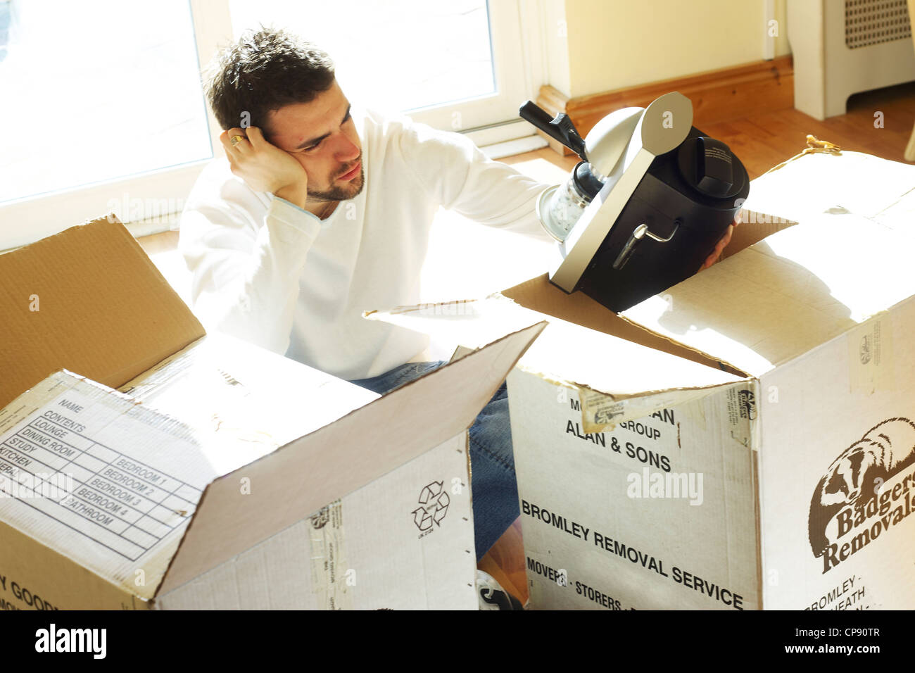 Man moving house Stock Photo - Alamy