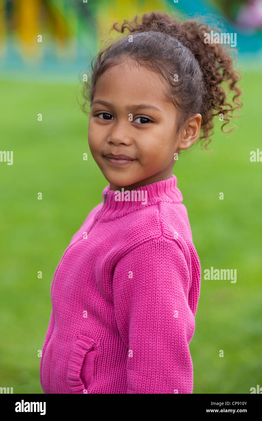 Outdoor portrait of a cute little African Asian girl Stock Photo - Alamy