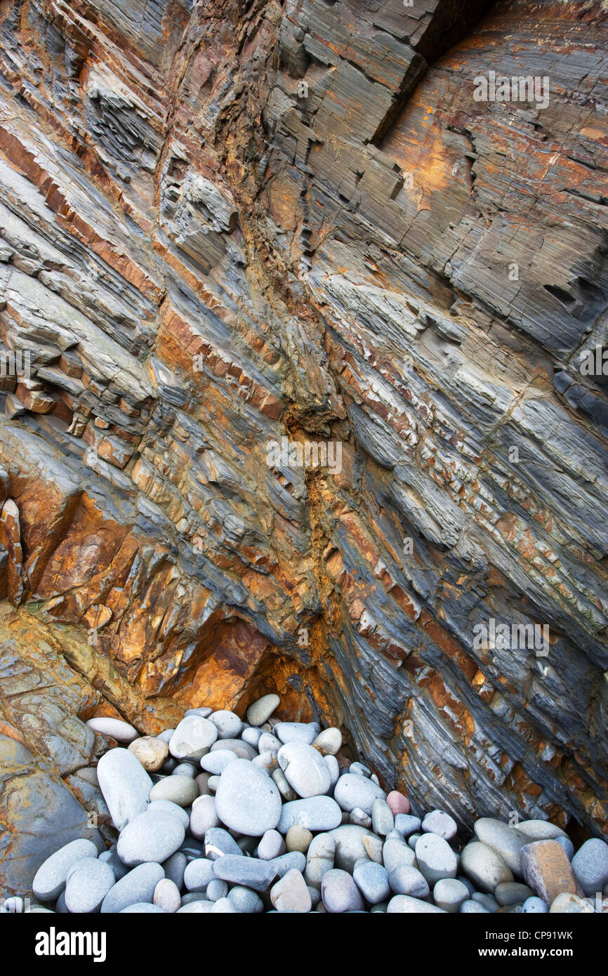 Vertical rock strata at a beach hi-res stock photography and images - Alamy