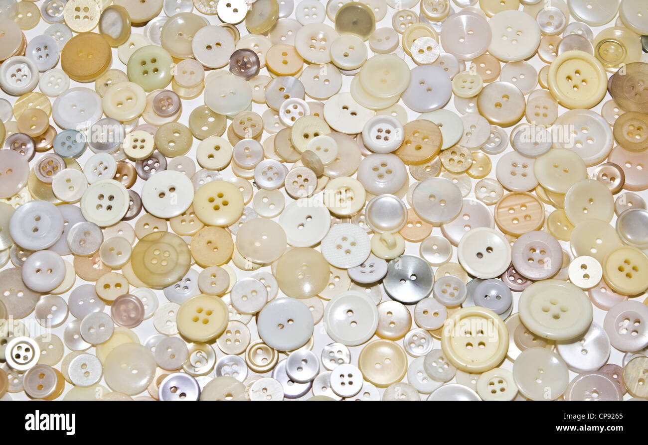 light color sewing buttons Stock Photo - Alamy