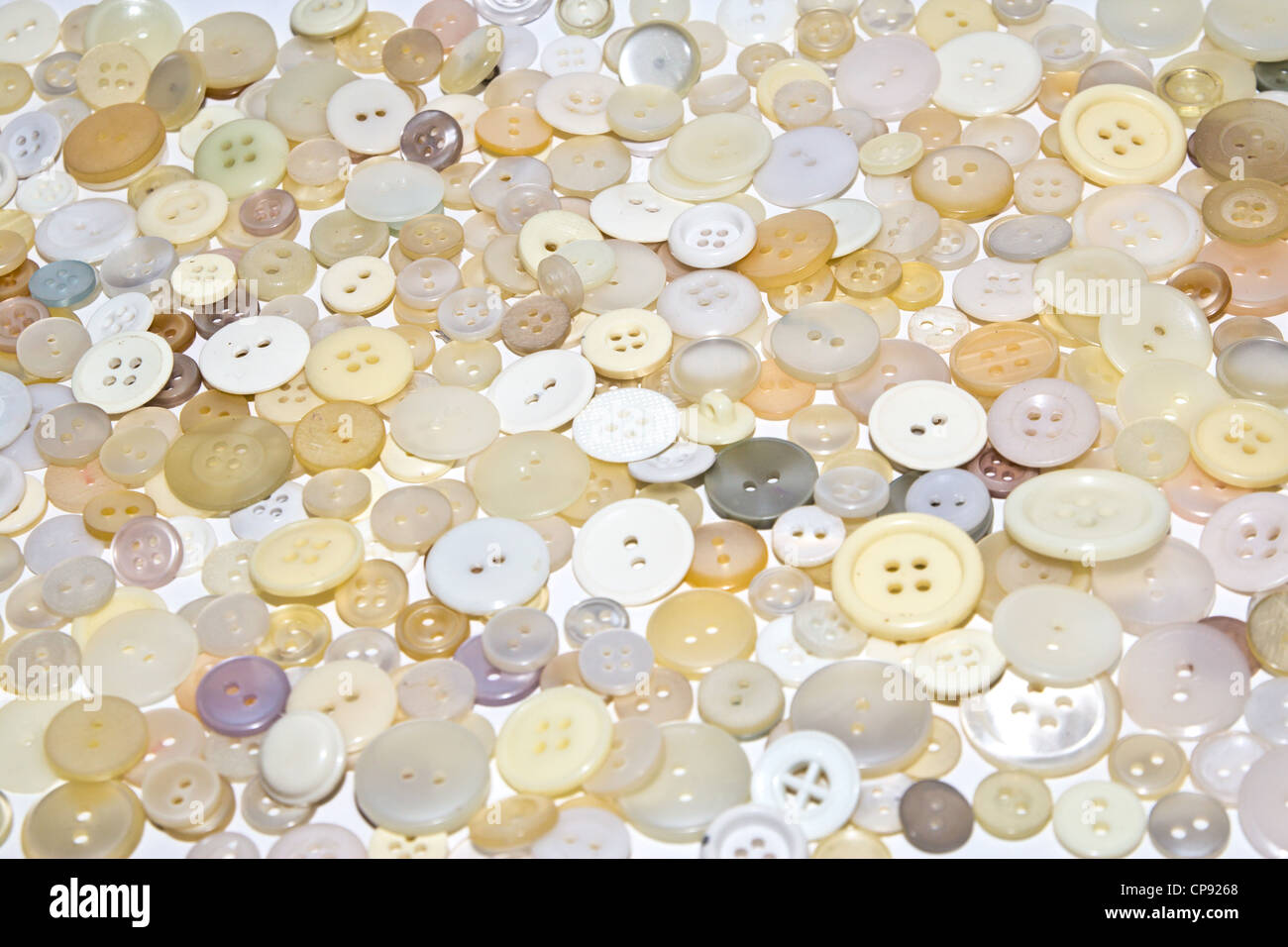 light color sewing buttons Stock Photo - Alamy
