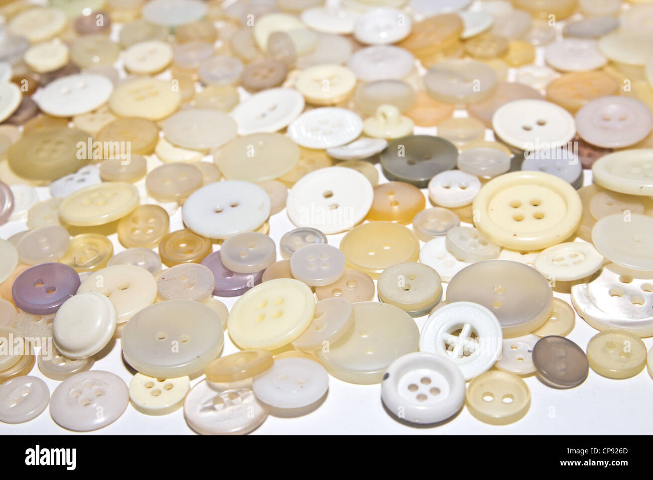 light color sewing buttons Stock Photo - Alamy
