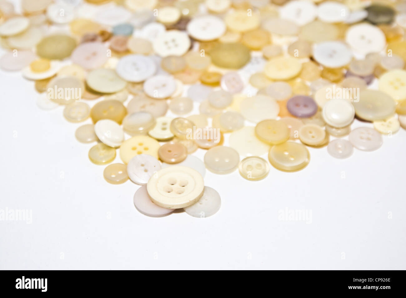 light color sewing buttons Stock Photo - Alamy