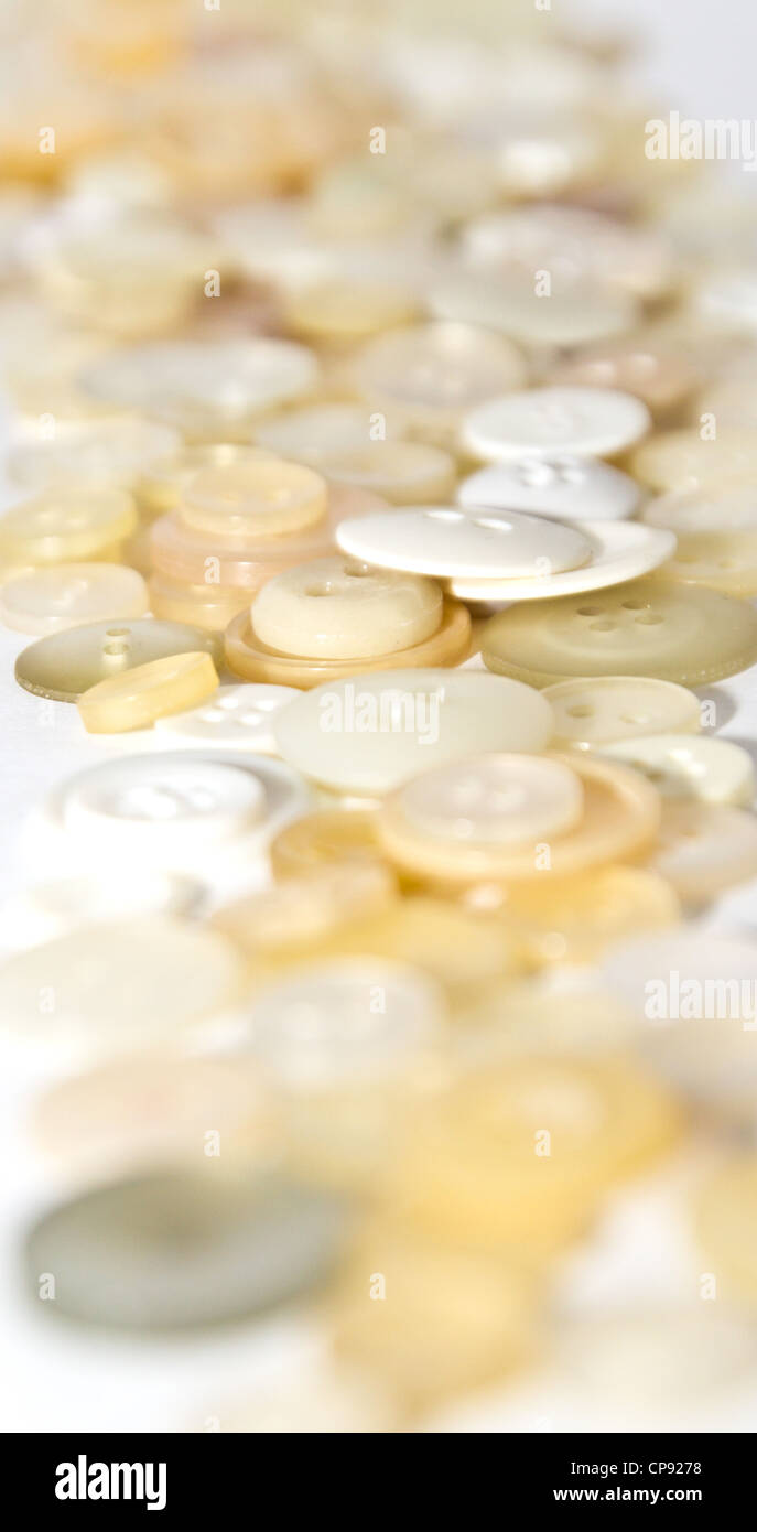 light color sewing buttons Stock Photo - Alamy