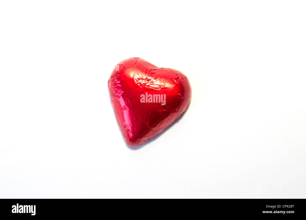 Foil wrapped chocolate heart hi-res stock photography and images - Alamy