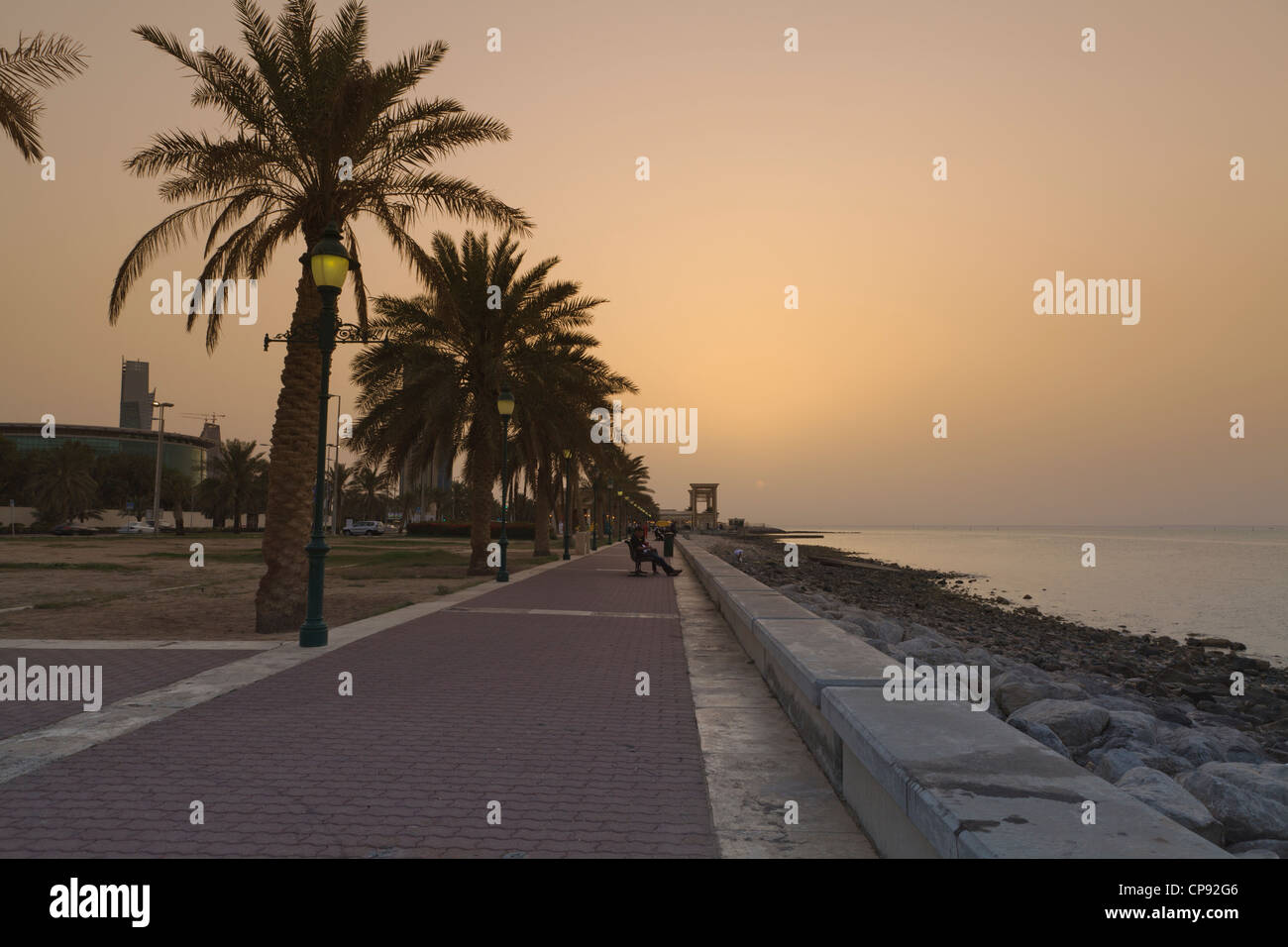 Coastal view along promenade off Gulf road in Kuwait City at dusk Stock ...