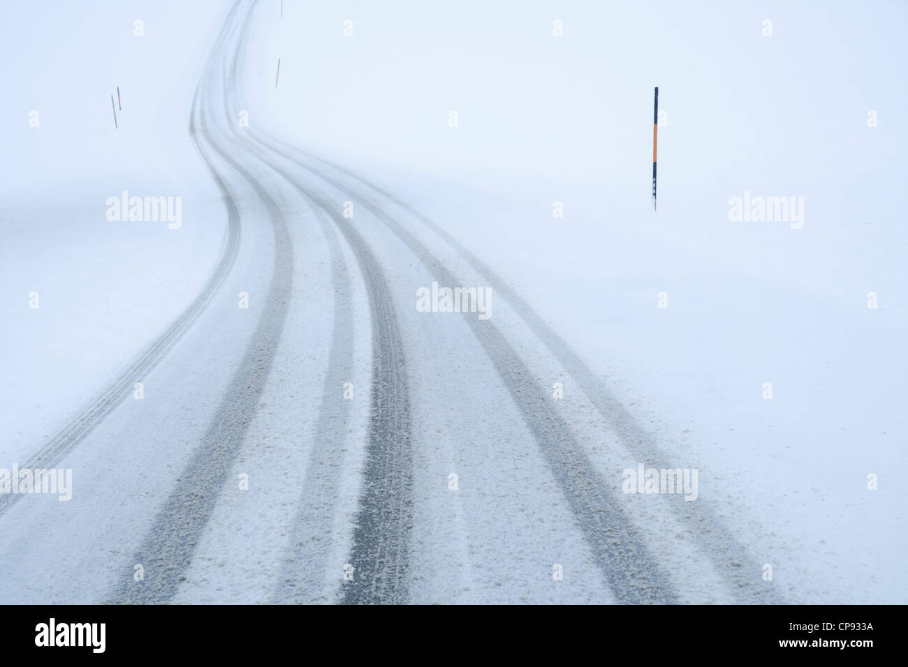 Germany, Upper Bavaria, View of snowy road near Ascholding Stock Photo - Alamy