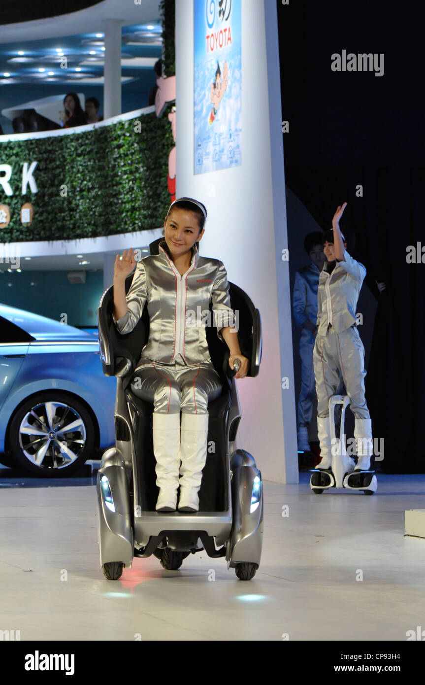 BEIJING - APRIL 29: A model drives a TOYOTA new serie of double engine ...