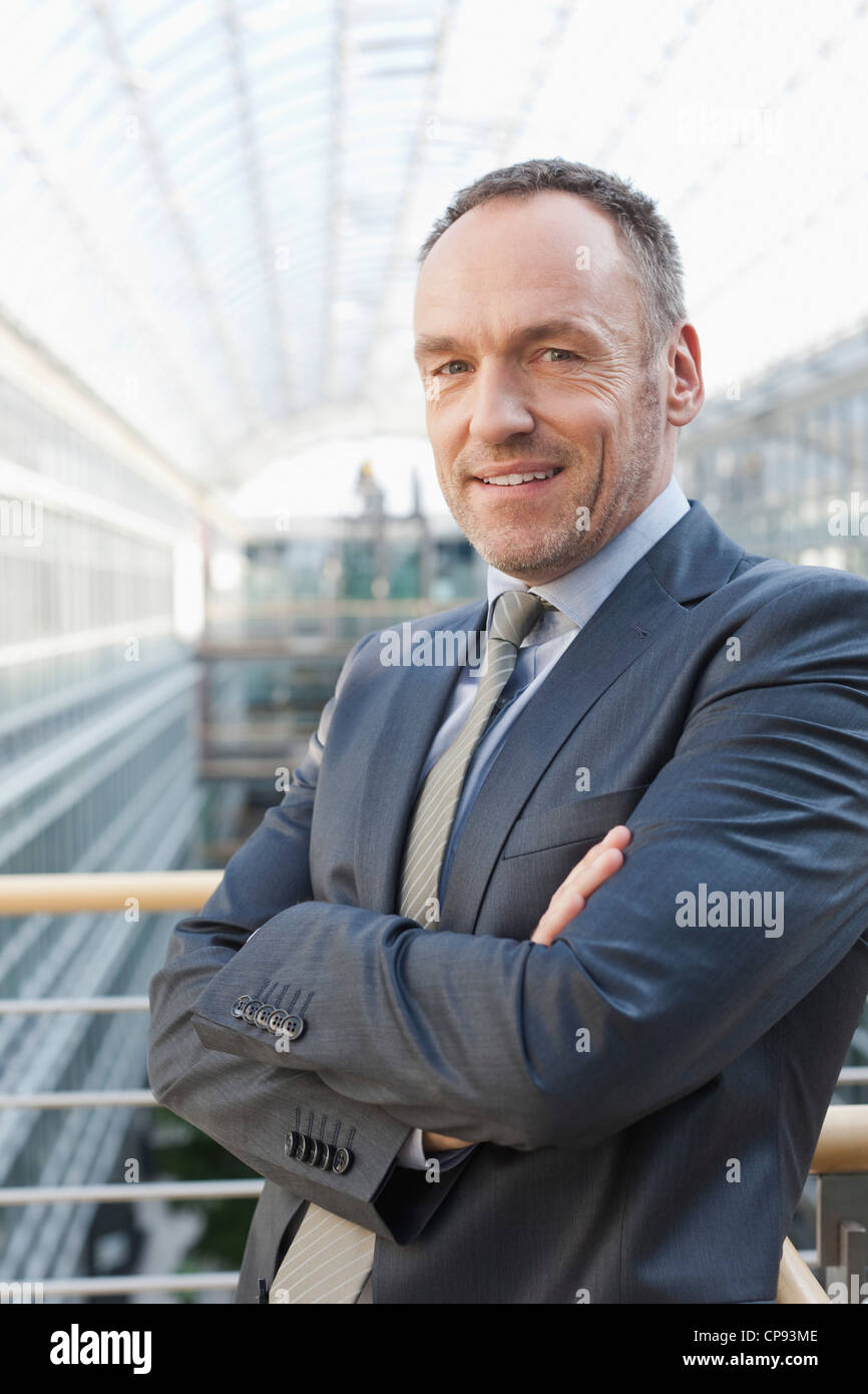Germany, Leipzig, Businessman smiling, portrait Stock Photo - Alamy