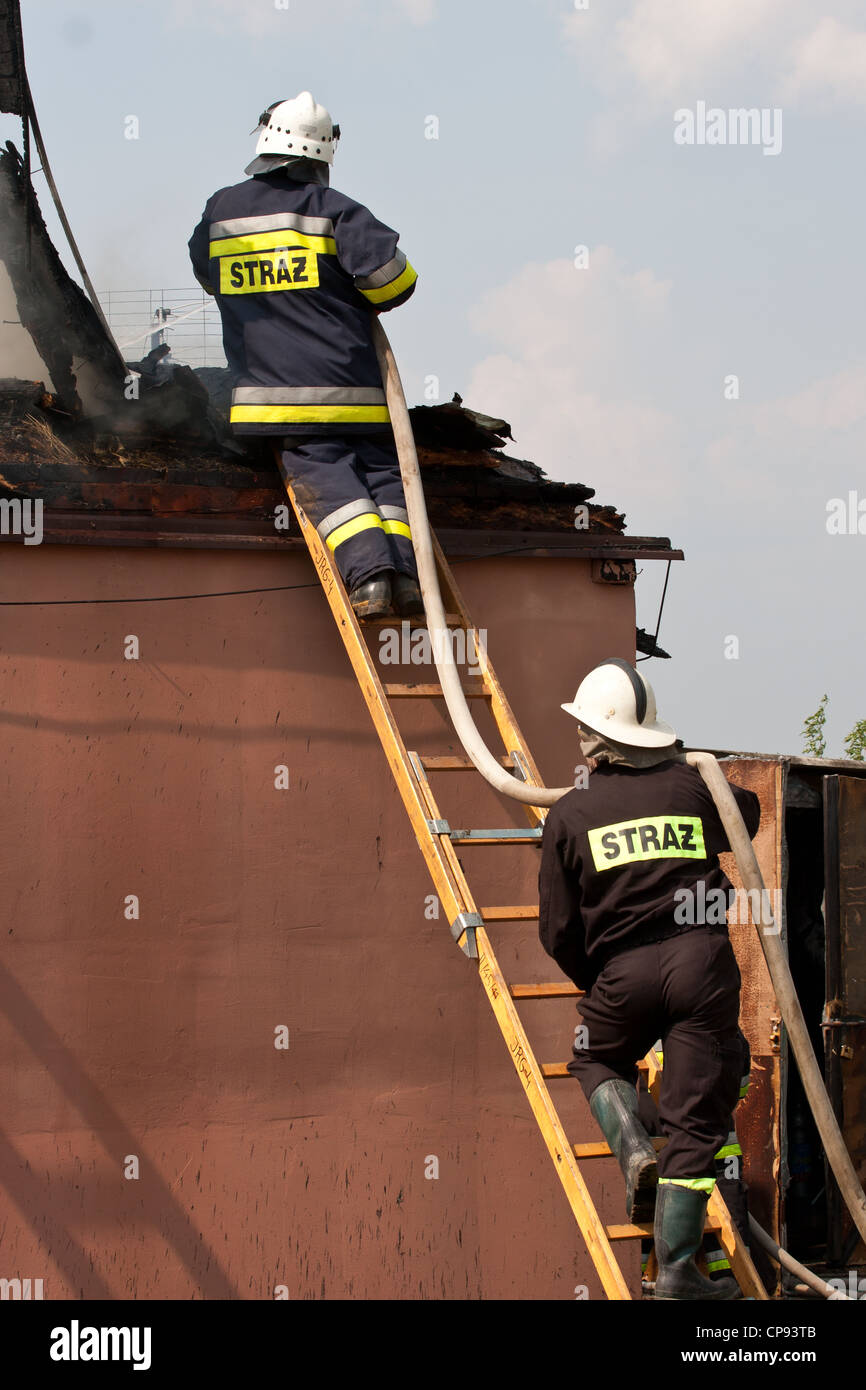 Fireman, rescue, burning building hi-res stock photography and images ...